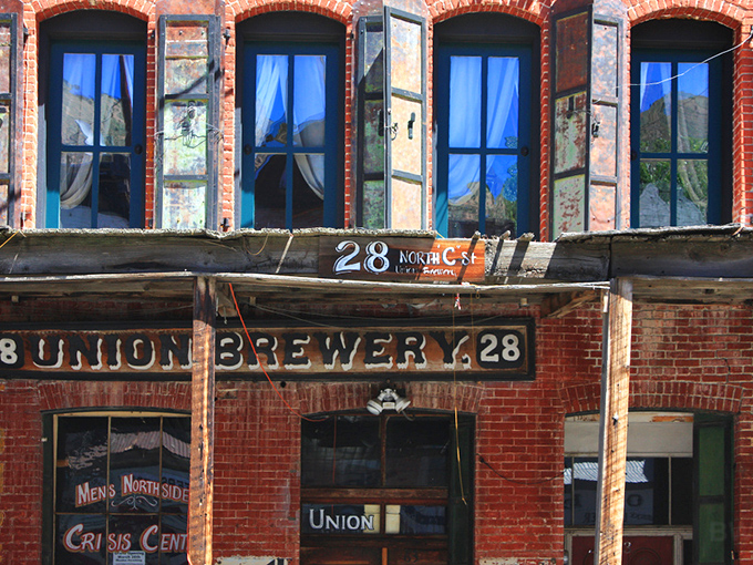 The Union Brewery's weathered brick facade tells tales of thirsty miners and modern visitors alike. Those blue windows have seen it all!