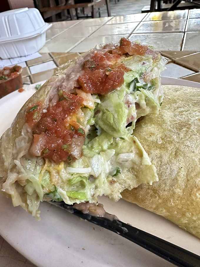 This veggie burrito bursts with fresh ingredients and personality. Like a garden party wrapped in a tortilla and dressed for success with pico de gallo.