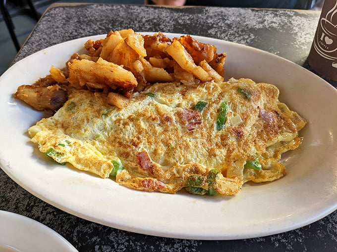 This Western omelet doesn't need Instagram filters&mdash;just perfectly browned edges, ham and peppers folded into fluffy eggs, alongside home fries that could convert a carb-avoider.