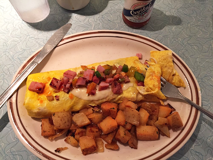 This Western omelet doesn't just contain ham and peppers&mdash;it tells a story of morning perfection alongside home fries that achieved crispy nirvana.