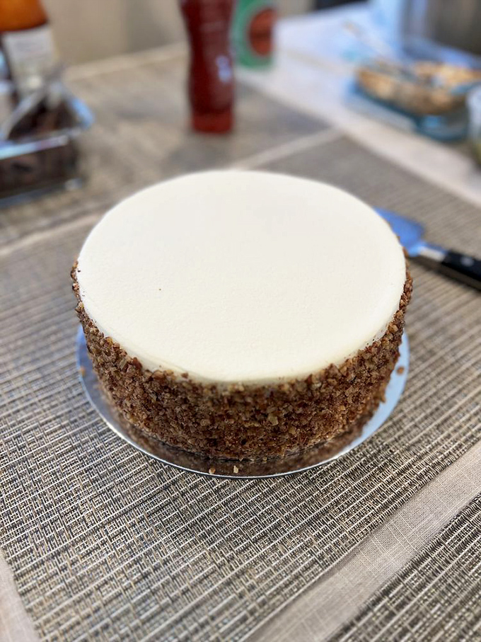 Behold the complete carrot cake in all its glory&mdash;a masterpiece of moist perfection ringed with toasted nuts that add just the right textural counterpoint.