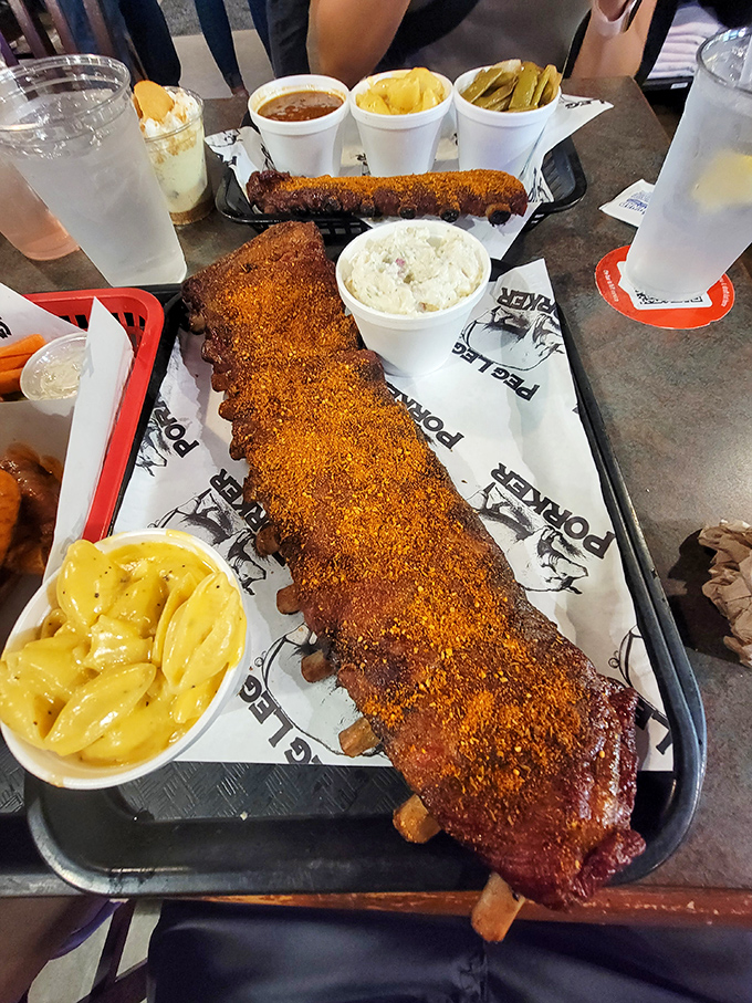 Behold the holy grail of barbecue&mdash;a full rack of dry-rubbed ribs displaying that perfect pink smoke ring beneath.