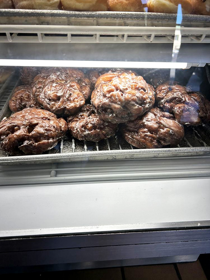 The holy grail of fritters, glistening with glaze and waiting to change your definition of what breakfast can be.