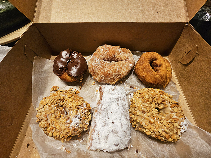 The donut box&mdash;nature's most perfect container. Six different paths to happiness, arranged with the precision of delicious edible art.