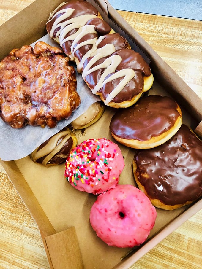 A cardboard box becomes a treasure chest when filled with these gems—the apple fritter alone could start a religion.