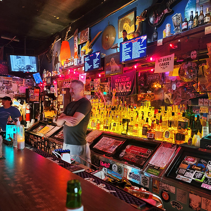 Behind this bar, stories flow as freely as the drinks. Notice the "No Debit Cards" sign&mdash;this place keeps one foot firmly in the analog age.