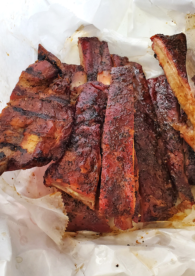 The pink smoke ring on this brisket isn't makeup—it's the unmistakable signature of time, smoke, and someone who truly cares.