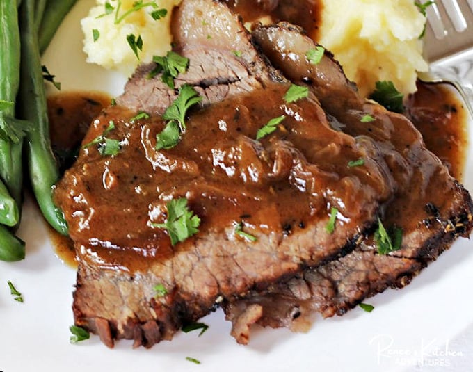 The rich, glistening sauce cascading over perfectly cooked beef might make you forget your table manners and lick the plate.