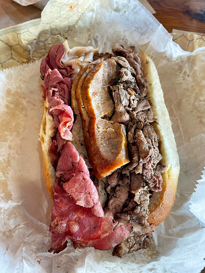 The "why choose one when you can have three" approach to sandwich construction. This isn't a meal; it's a meat festival between bread.