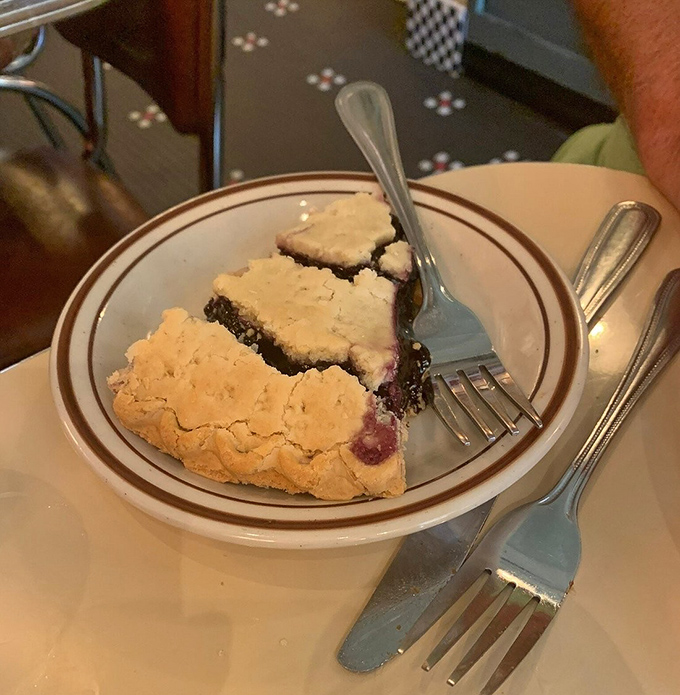 This blueberry pie doesn't just have a flaky crust—it has structural integrity that engineers would admire, holding a filling that's summer in every bite.