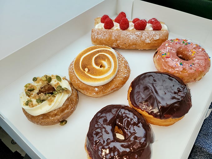 A box of Dutch Monkey's artisanal creations makes grocery store donuts look like sad, stale hockey pucks. The raspberry-topped long john is practically winking at you.