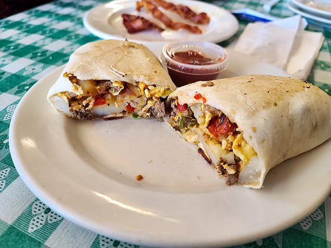 This breakfast burrito doesn't just break the fast; it demolishes it with a colorful explosion of morning flavors.