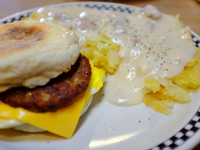 The breakfast sandwich that launched a thousand road trips. Cheese melting over sausage with hash browns smothered in gravy&mdash;cardiologists hate this one weird trick!