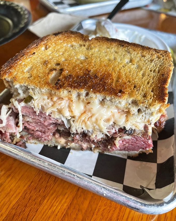 The Brooklyn Reuben reveals its secrets: perfectly grilled rye, Russian dressing oozing out the sides, and enough meat to feed a small borough.