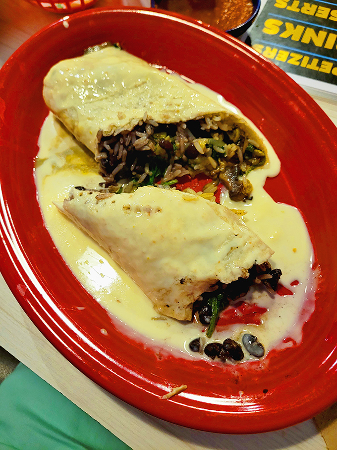 Cut into this burrito and witness the romance between cheese sauce and perfectly seasoned fillings. A love story told in every steaming bite.