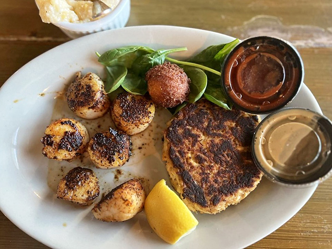 The dynamic duo: perfectly seared crab cake meets blackened scallops. Like Batman and Robin, if they were delicious and served with sauce.