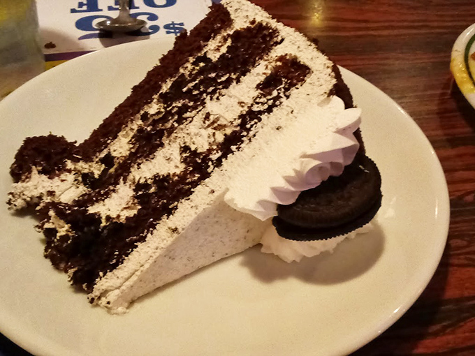Layers of chocolate cake separated by cream filling&mdash;like a tuxedo for your taste buds, complete with an Oreo sidekick.
