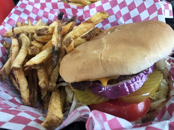 No pretentious vertical stacking or fancy aioli here&mdash;just an honest burger with hand-cut fries that would make fast food chains weep with inadequacy.