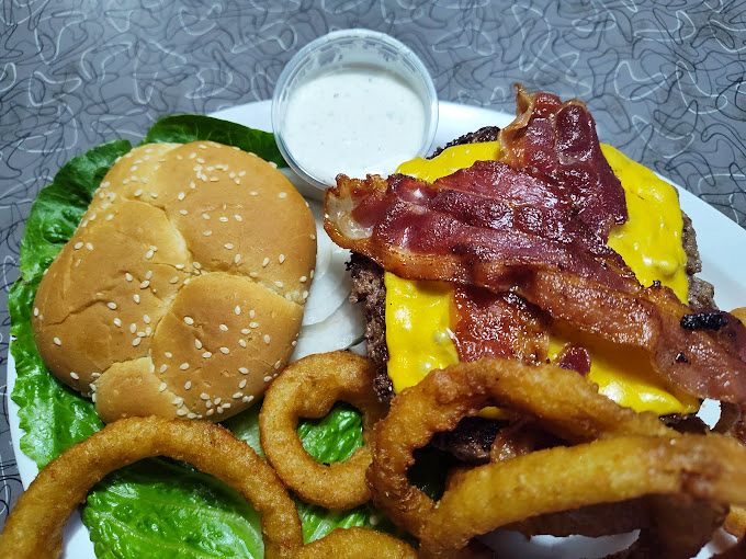 The bacon cheeseburger that launched a thousand cravings &ndash; crispy, melty, and substantial enough to require both hands and several napkins.
