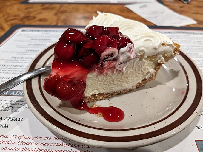 Behold the cherry cheesecake in its natural habitat&mdash;a plate that's about to witness the fastest disappearing act in Kansas.
