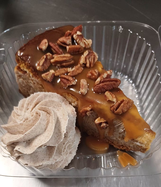 Caramel cascading over cheesecake with candied pecans&mdash;nature's perfect combination, like Fred Astaire and Ginger Rogers dancing on your palate.