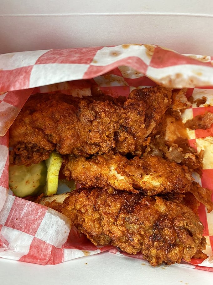 Pickle-punctuated chicken perfection. Each morsel promises a crunch that could wake the neighbors, followed by heat that might make you call them for help.