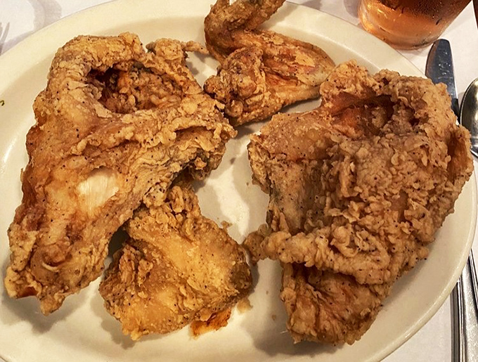 Behold the holy grail of Southern fried chicken&mdash;crackling skin giving way to juicy meat beneath. This plate has launched a thousand food pilgrimages.
