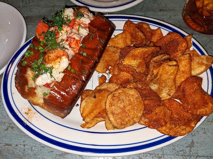 Another angle on seafood nirvana: The Optimist's lobster roll doesn't just satisfy hunger&mdash;it creates memories that linger longer than the lemon's tang.