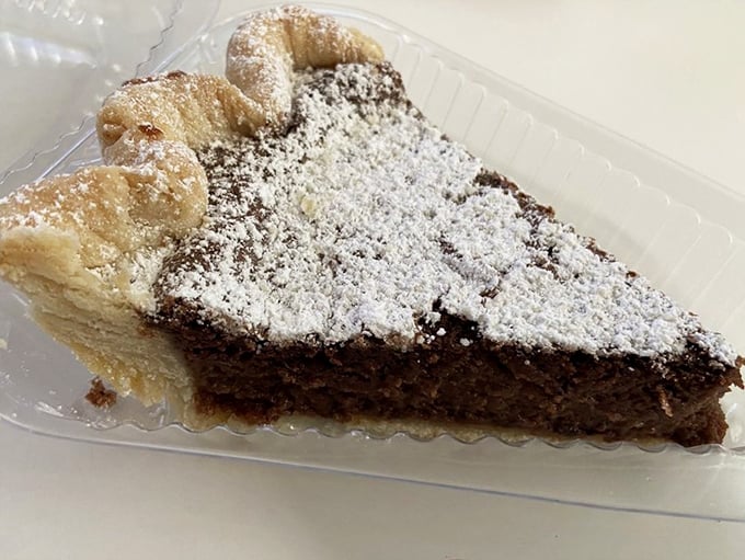 Chocolate chess pie dusted with powdered sugar bliss. Every forkful whispers, "Diet? What diet?"