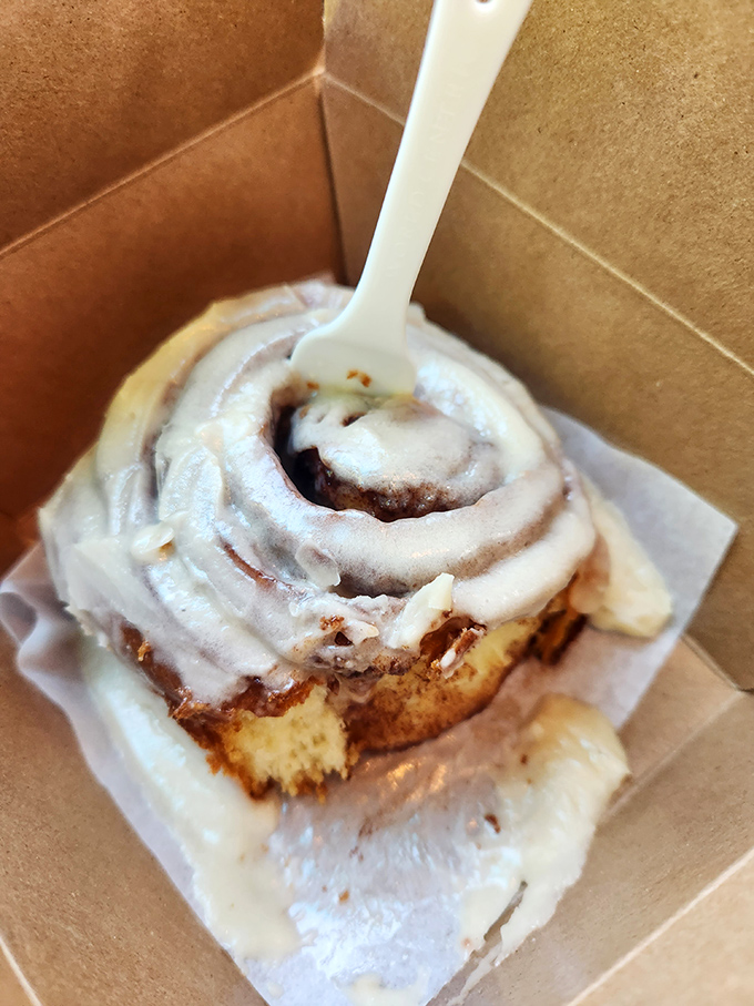 The cinnamon roll's frosting-to-dough ratio achieves what most world peace negotiations cannot: perfect harmony with zero compromise.