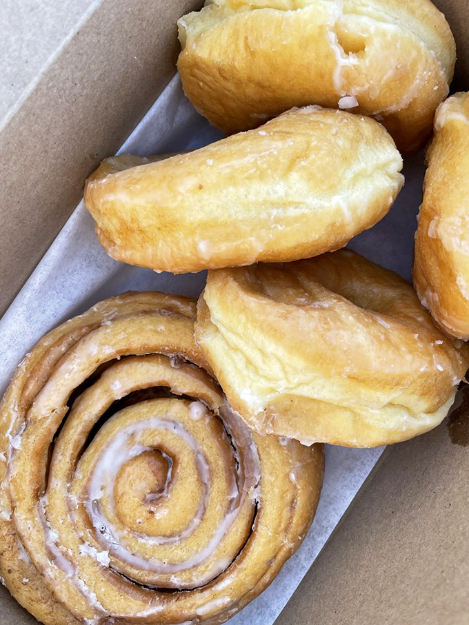 The spiral of a fresh cinnamon roll nestled among glazed beauties&mdash;a pastry pinwheel that's worth getting out of bed for at ungodly hours.