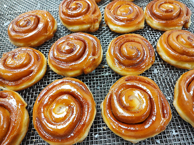 Cinnamon rolls fresh from the oven, glistening with promise. If these spirals of joy were currency, we'd all be billionaires in Bristol.