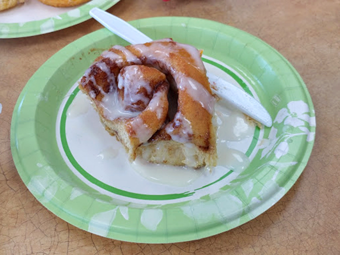 This isn't just breakfast; it's a religious experience on a paper plate. The cream cheese frosting melts just enough to create pastry perfection.
