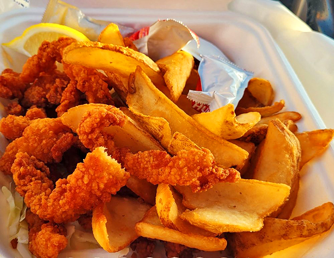 The kind of fried clams that make you wonder why you ever eat anything else, with fries that deserve equal billing.