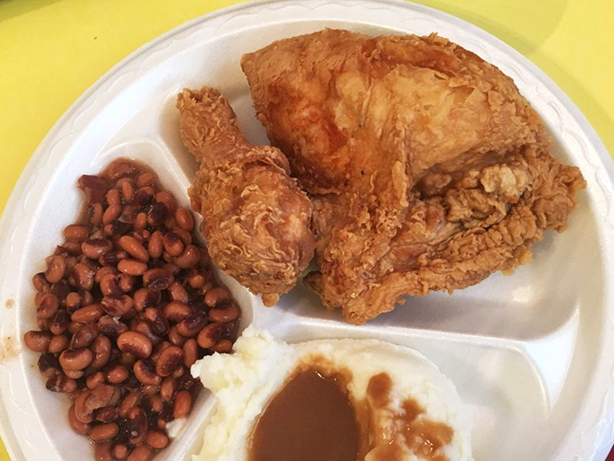 A holy trinity of Southern comfort: crispy chicken, hearty beans, and mashed potatoes with gravy. Comfort food doesn't get more spiritual than this.
