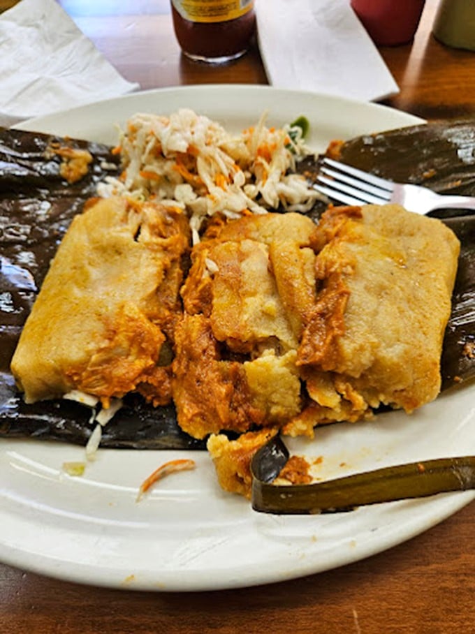 This tamale doesn't just fall apart &ndash; it surrenders with dignity, revealing inner secrets that will haunt your dreams in the best possible way. 