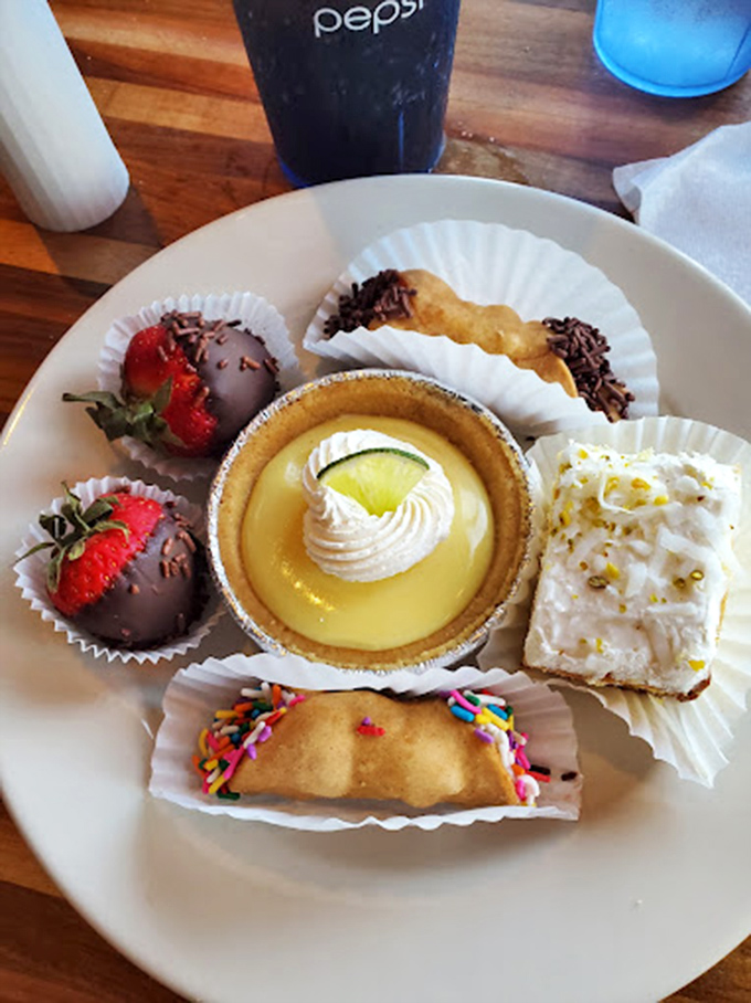 The dessert plate that says, "Yes, I deserve all of this." Key lime tart, chocolate-dipped strawberries, and coconut treats&mdash;because saving room is overrated.