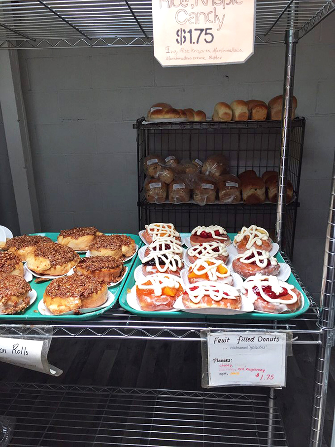 Fruit-filled donuts that make you question every other breakfast decision you've ever made. The white icing zigzags aren't decoration&mdash;they're road maps to happiness.