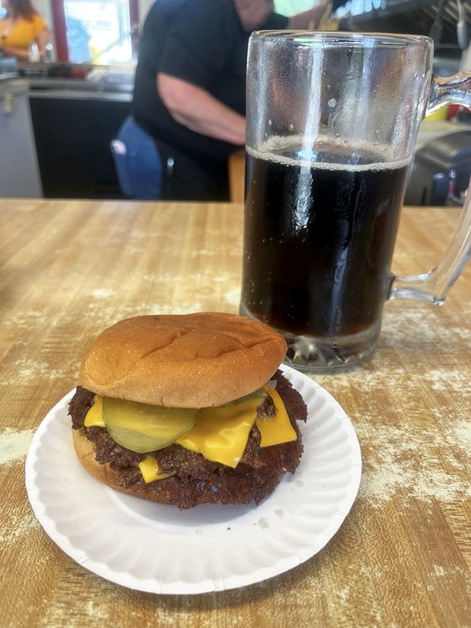 The double cheeseburger and root beer combo: proving that life's greatest pleasures don't need constant reinvention, just consistent execution.