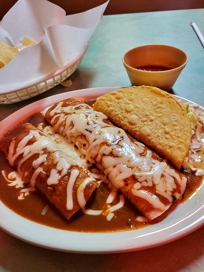 The perfect relationship doesn't exi&mdash; Oh wait, it does: enchiladas and tacos sharing a plate like they were meant to be together.