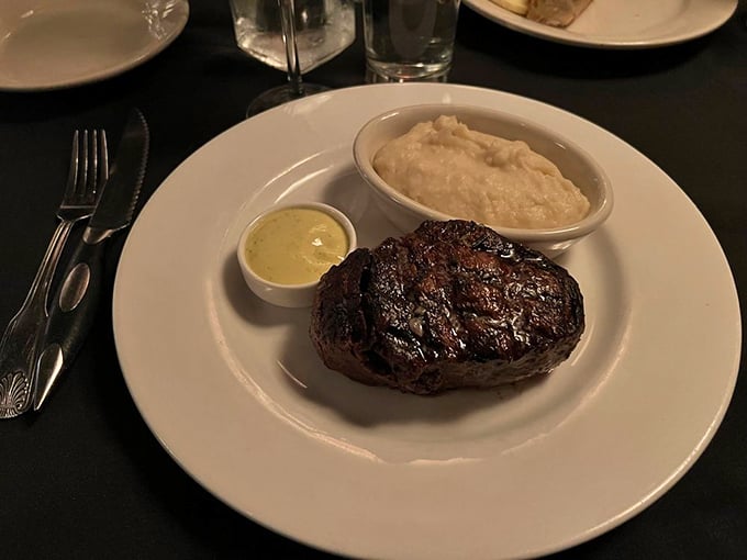 A filet mignon that could make vegetarians question their life choices, accompanied by mashed potatoes that clearly weren't born from a box.