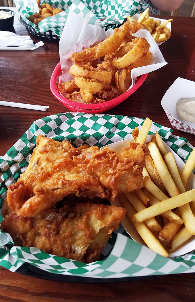 The fish and chips arrive like old friends you've missed desperately. That perfect crisp-to-flake ratio is the stuff of midnight cravings.