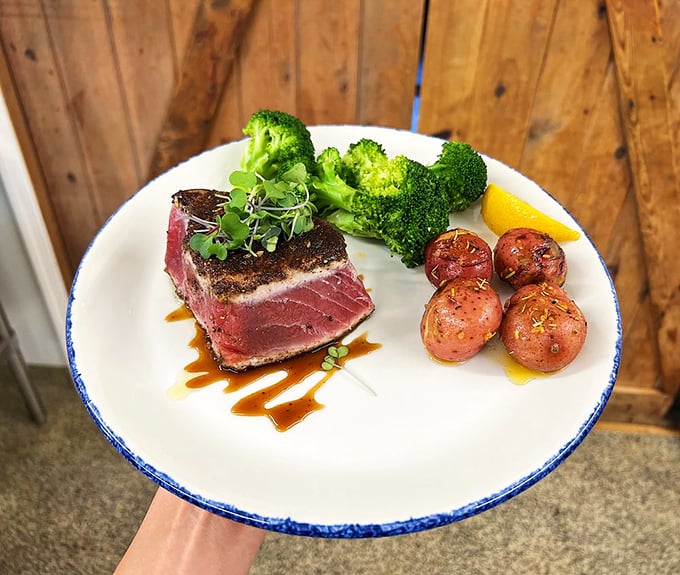 This perfectly seared tuna steak isn't just dinner&mdash;it's edible art. The roasted potatoes and vibrant broccoli provide the supporting cast this star deserves.