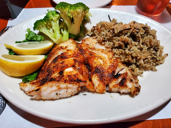 Blackened fish that would make Neptune himself jealous, perfectly paired with wild rice and broccoli. Proof that simplicity, when done right, is culinary magic.