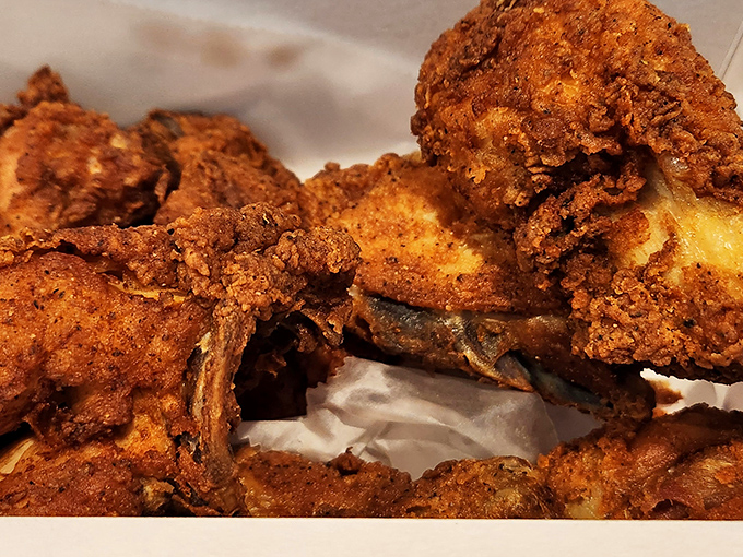 The kind of fried chicken that makes you temporarily forget your table manners. Napkins are merely a suggestion here.
