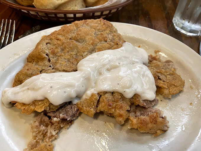 When your chicken fried steak requires structural engineering to stay intact, you know you've found the real deal. That gravy river should have its own zip code.