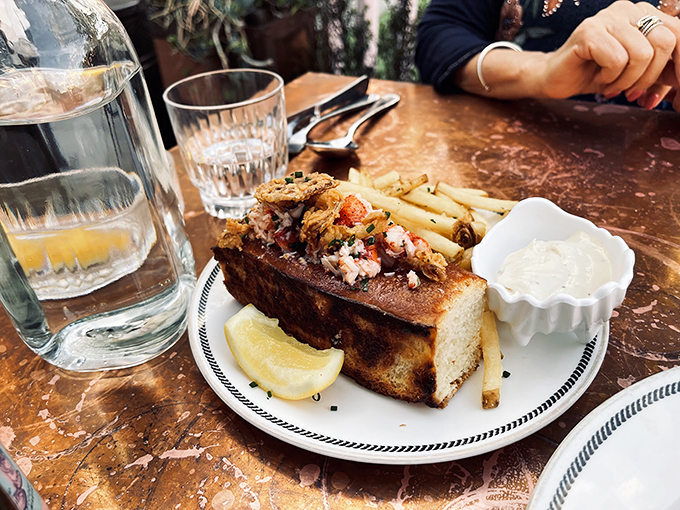 This isn't just a lobster roll &ndash; it's Maine's finest crustacean vacation-housing in a perfectly toasted brioche bun with crispy fries as neighbors.