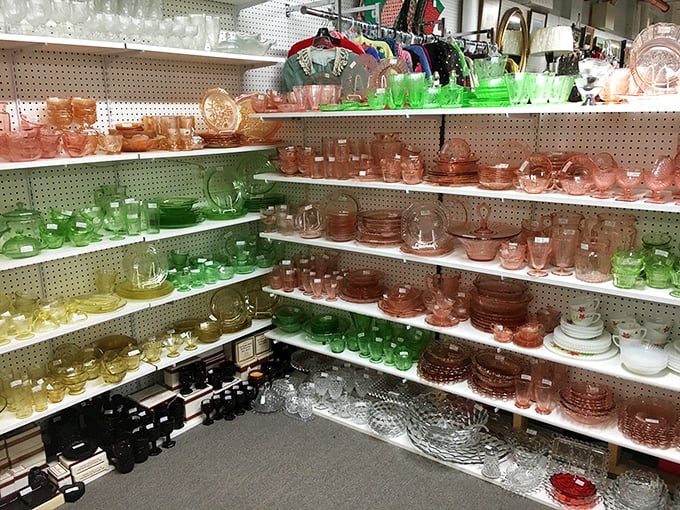Depression glass heaven! These shelves of pink, green, and amber treasures are like a sunset captured in glassware form.