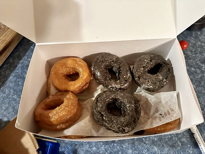 The classic debate: glazed or chocolate? At Krumpe's, the correct answer is always "yes, please" to both. White box, simple packaging, extraordinary contents.