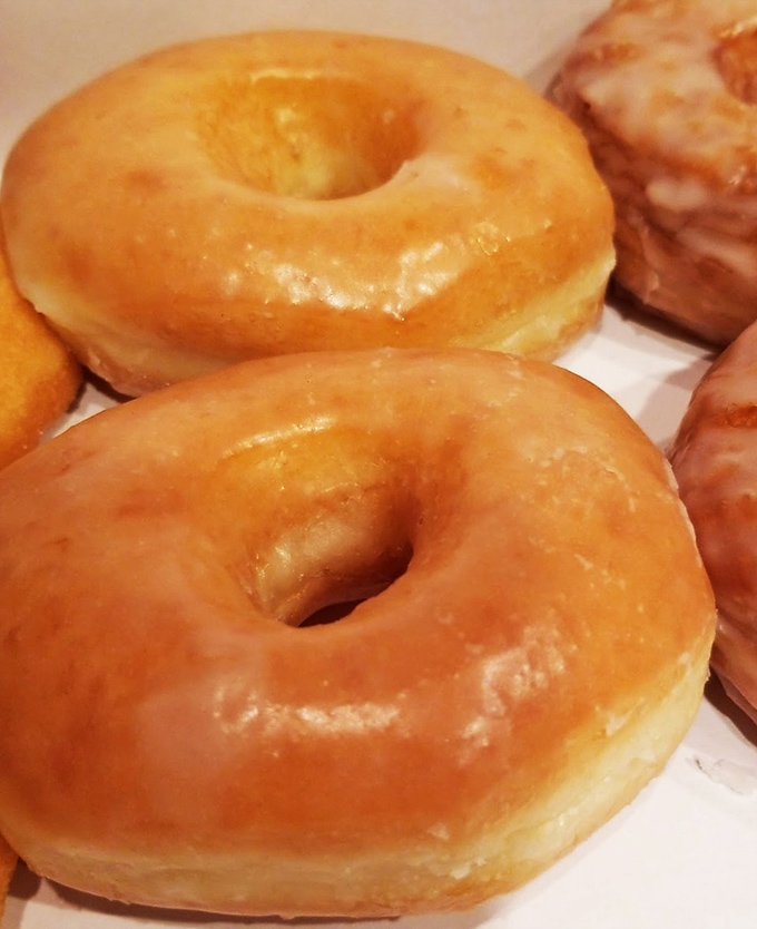 The humble glazed donut&mdash;proof that sometimes the simplest pleasures are the most profound. Golden, glistening, and utterly irresistible.